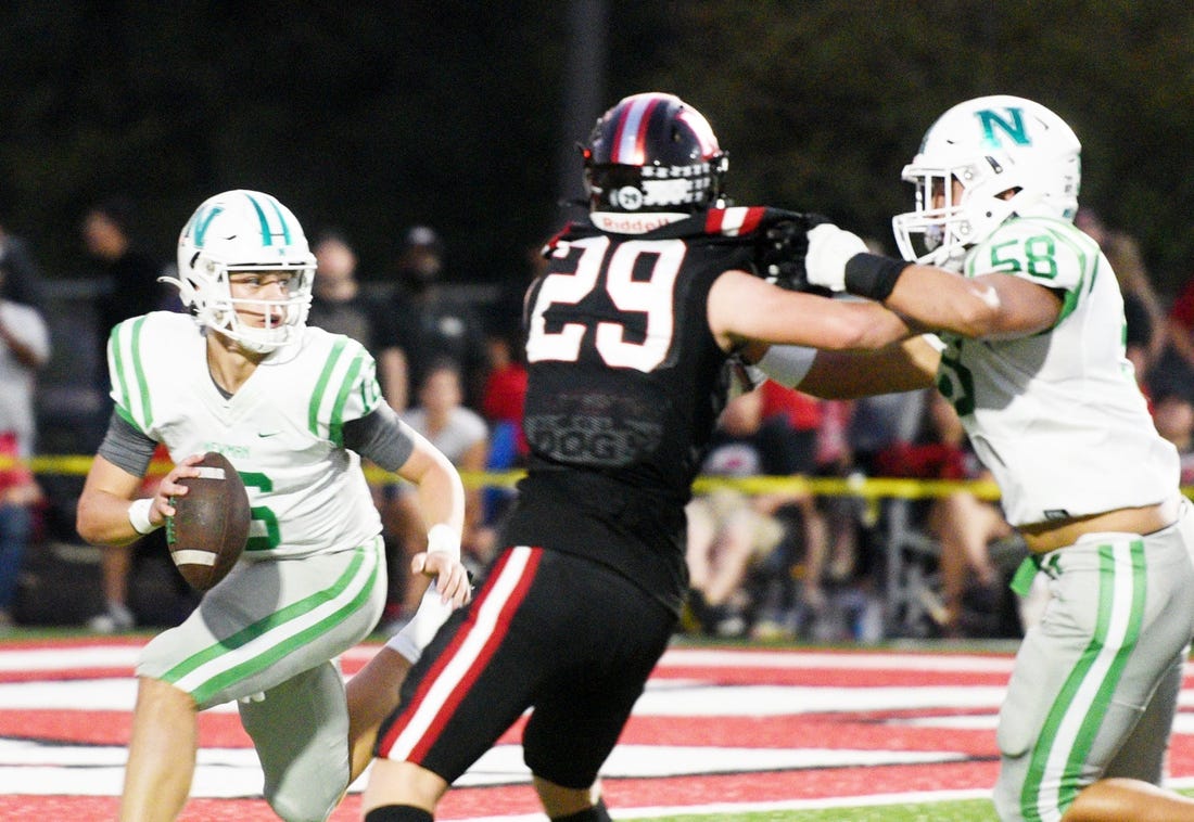 Arch Manning breaks uncles' school passing records - CWEB